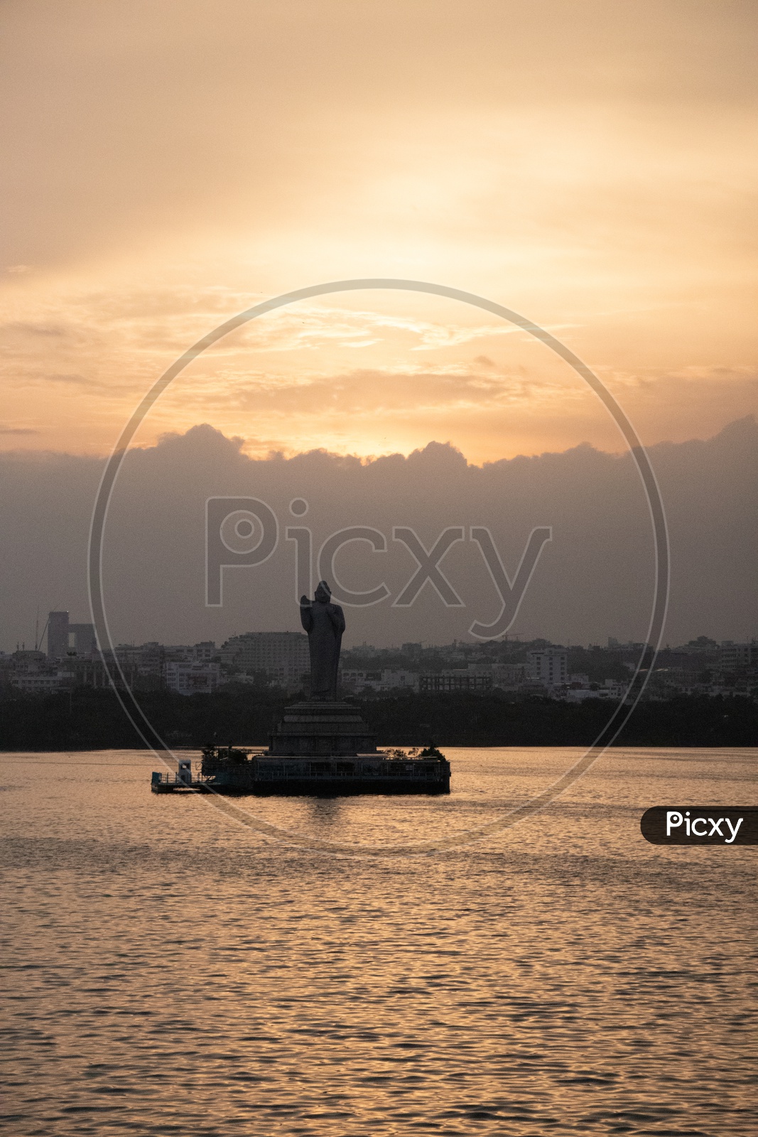 Image of Buddha Statue on Hussain Sagar Lake With Sunset Sky In ...