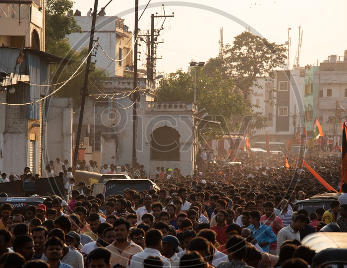 Image of Crowd Of Hindu devotees Carrying Saffron Flags At Sri Rama Navami Shoba Yatra-AQ879556 ...