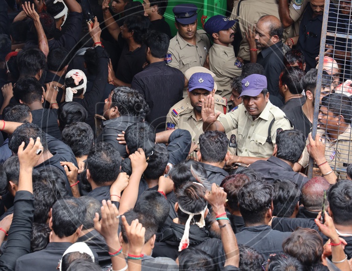Image of Crowd Of Muslim Devotees Offering Mourns By flagellation ...