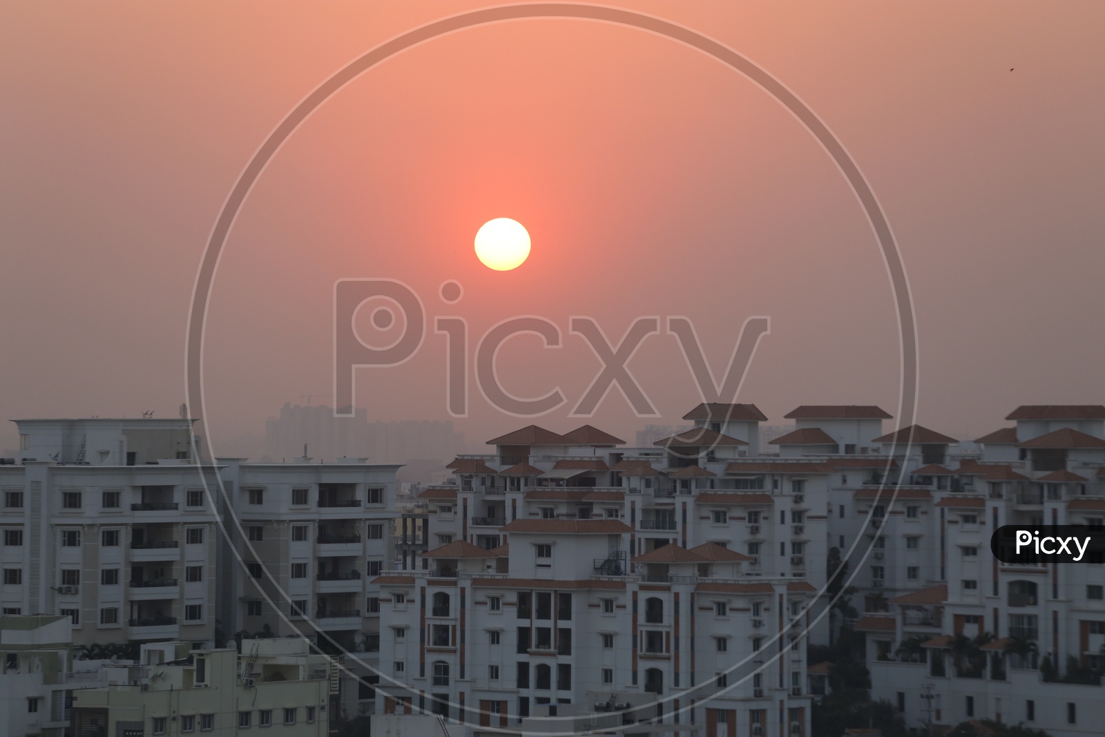 Image of Sunset Over High Rise Buildings Or Apartments Closeup-TX875381 ...