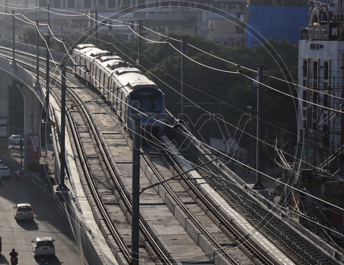 Image of Hyderabad Metro Train Running on Railway Track Lines With ...
