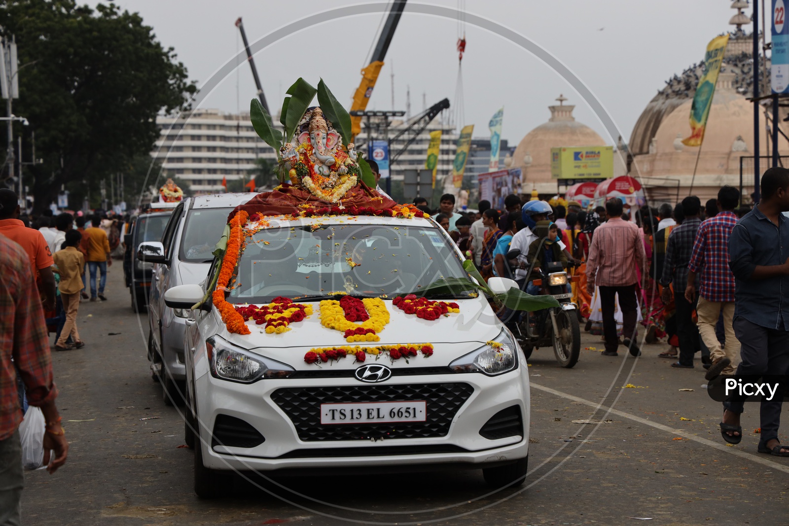 Image of Lord Ganesh Idols On Car top During Ganesh Visarjan Event ...