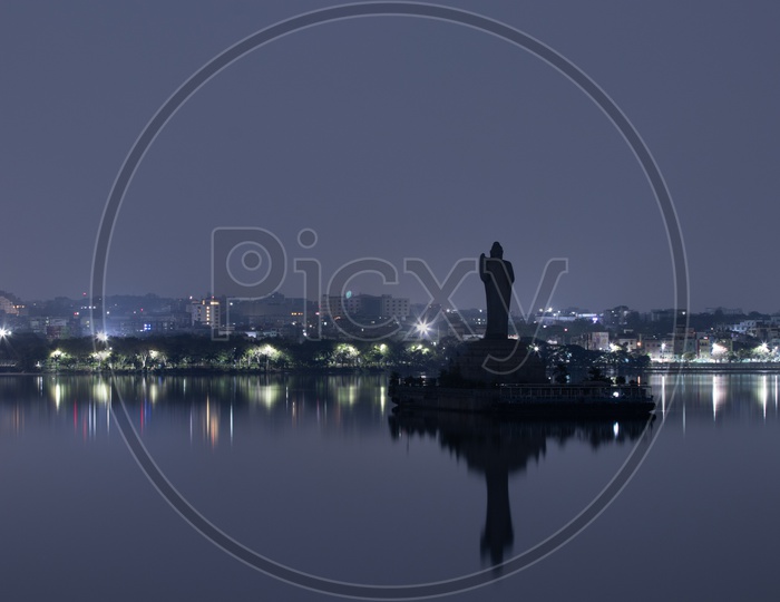 Image of Silhouette Of Gautham Buddha Statue In Hussain Sagar Lake And ...