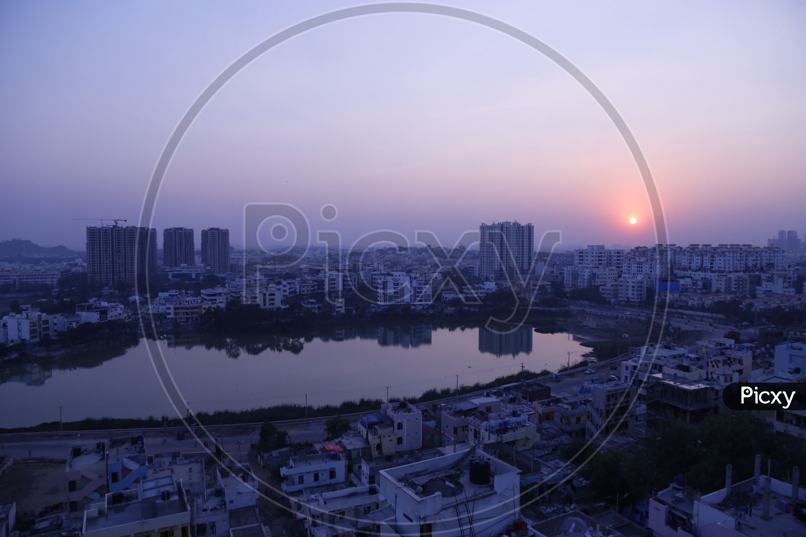 Image of Sunset Over Hyderabad City Scape With Lake And High Rise ...