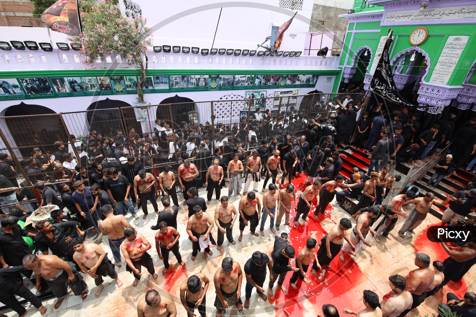Image of Muharram Mourning By Muslim Devotees At Bibi Ka Alawa By Flagellating With Blades ...