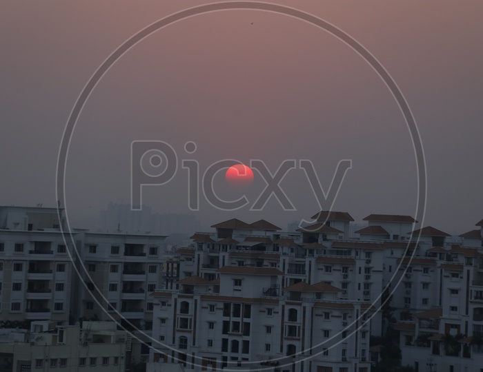 Image of Sunset Over High Rise Buildings Or Apartments Closeup-TC606058 ...