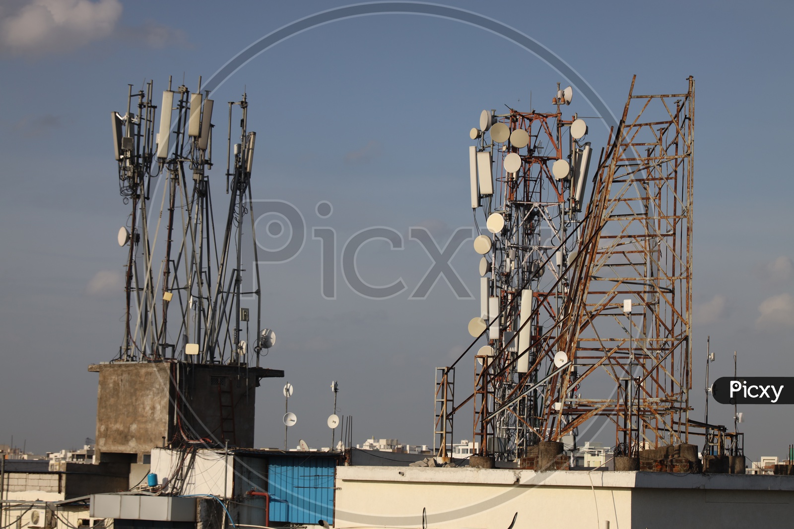 Image of Cell Phone Network Towers On House Terrace-VJ942916-Picxy
