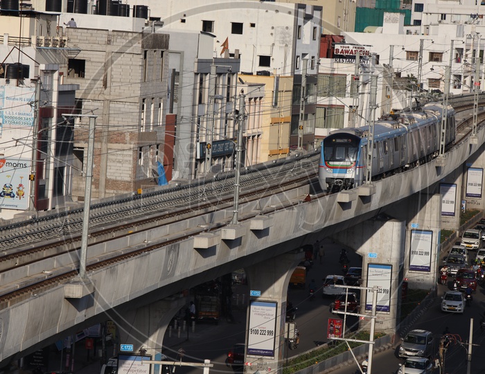 Image of Hyderabad Metro Train Running on Railway Track Lines With ...