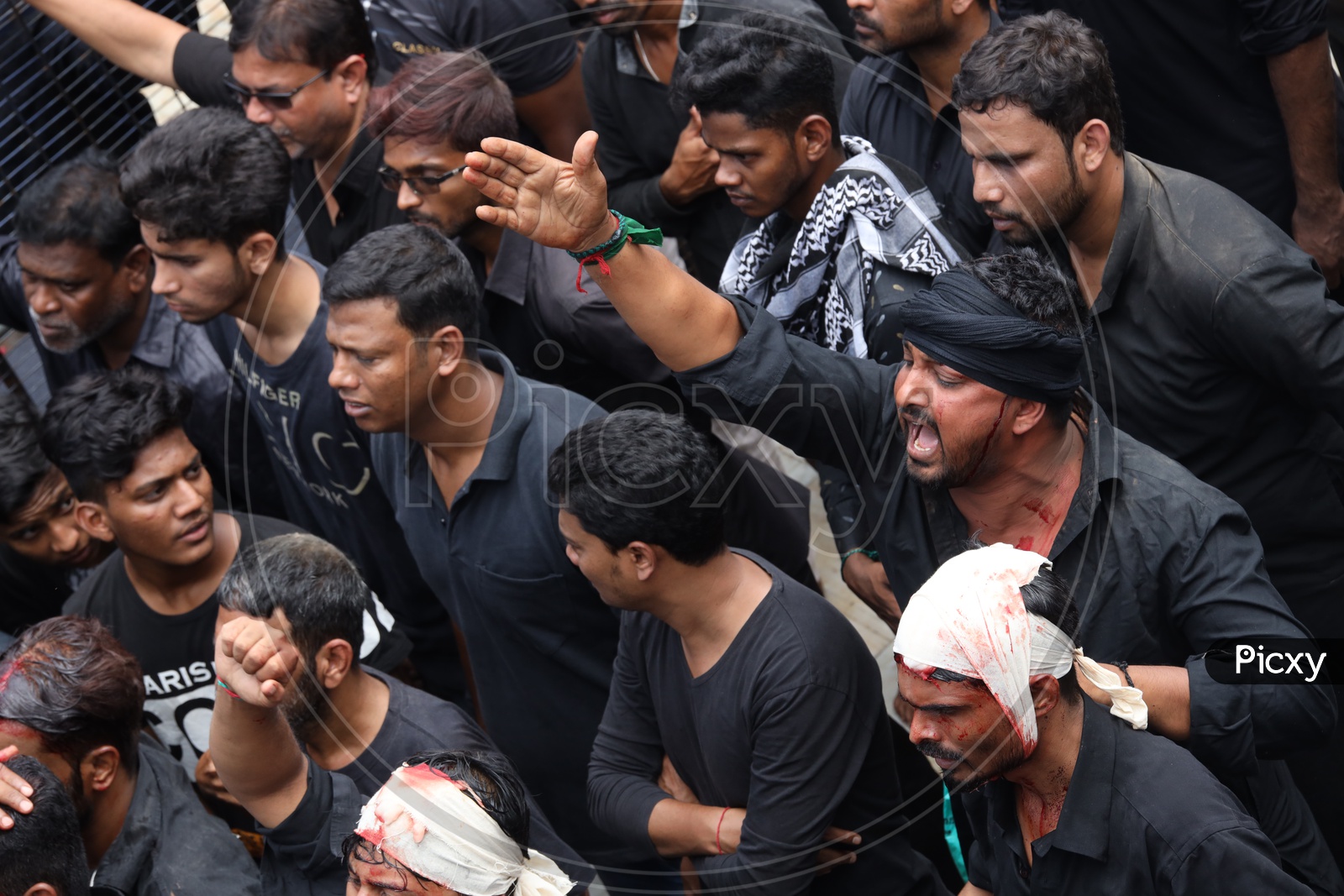Image of Crowd Of Muslim Devotees Offering Mourns By flagellation ...