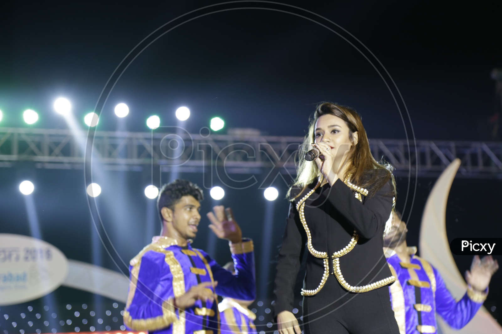 Image of beautiful Girl Performing Live On Stage Singing And Dancing At ...