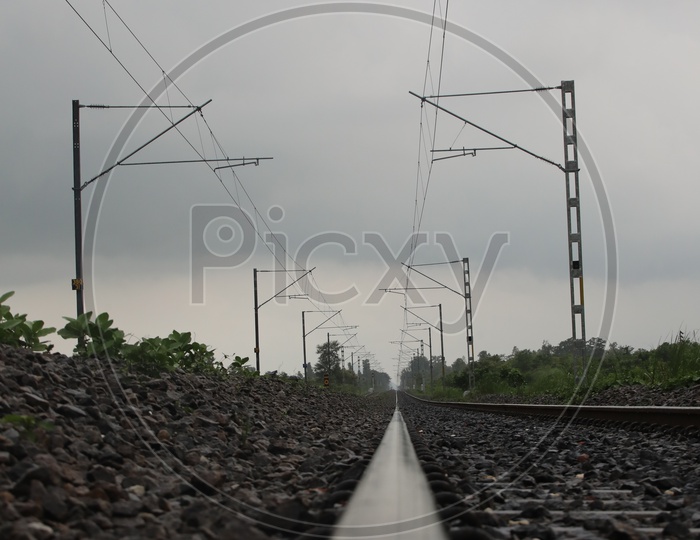 Image of An Empty Railway Track Line With Track And Electric Poles With ...