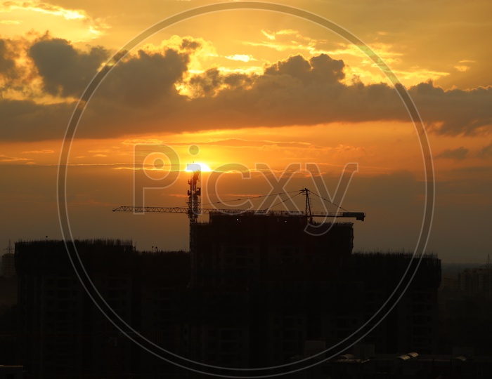 Image of Silhouette Of High Rise Buildings Over City Scpae With Sunset ...