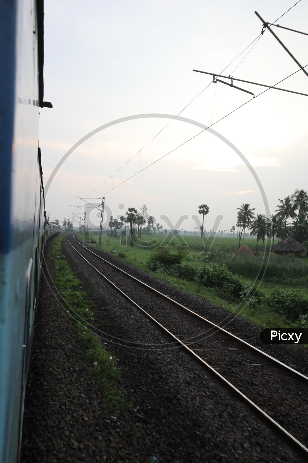 Image of Indian Railways Train Running On Track Lines With Electric ...