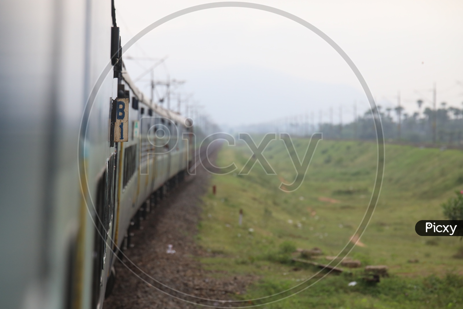 Image of Indian Railways Train Running On Track Lines With Electric ...