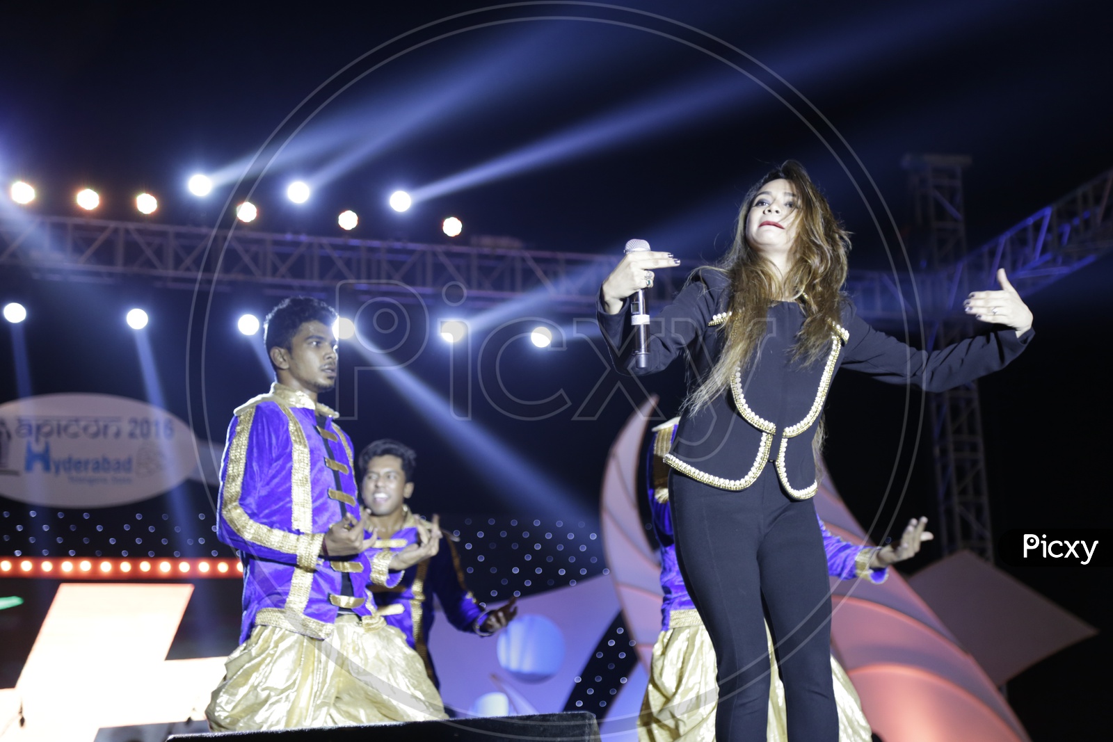 Image of beautiful Girl Performing Live On Stage Singing And Dancing At ...