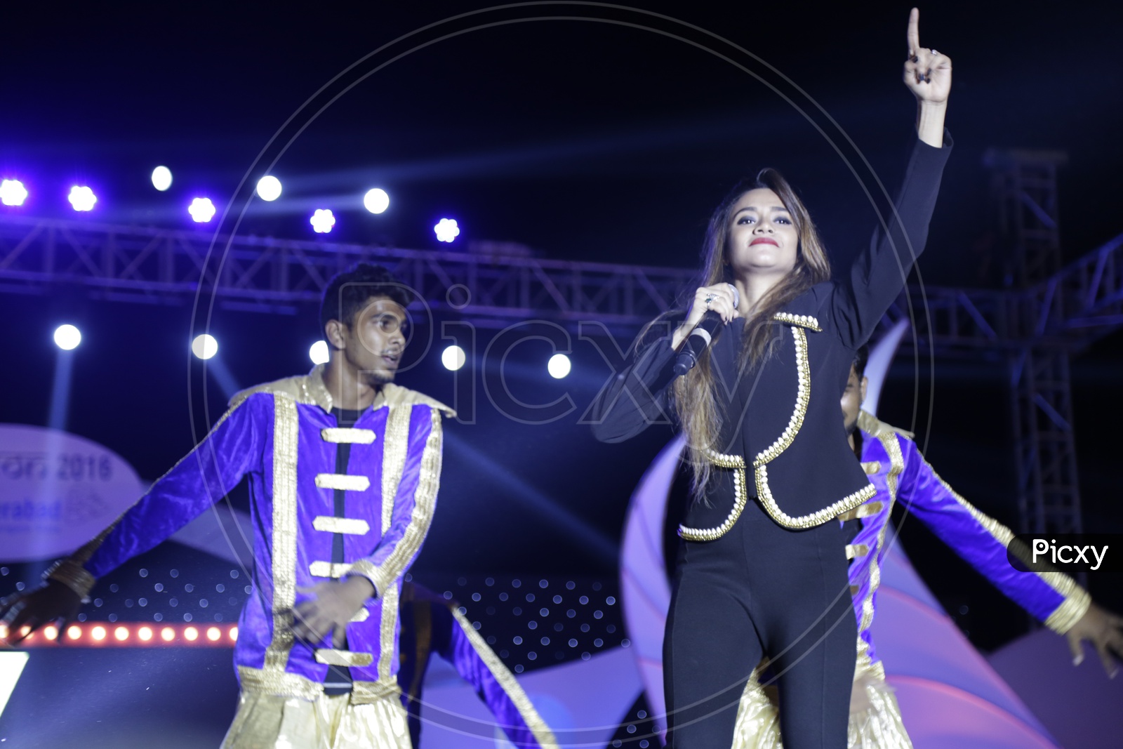 Image of beautiful Girl Performing Live On Stage Singing And Dancing At ...