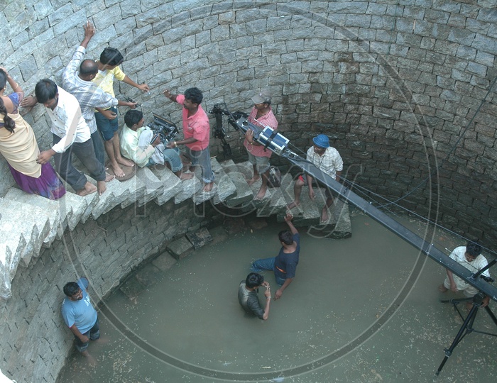 Image of Telugu Movie Shooting in a Old Well-UH605603-Picxy