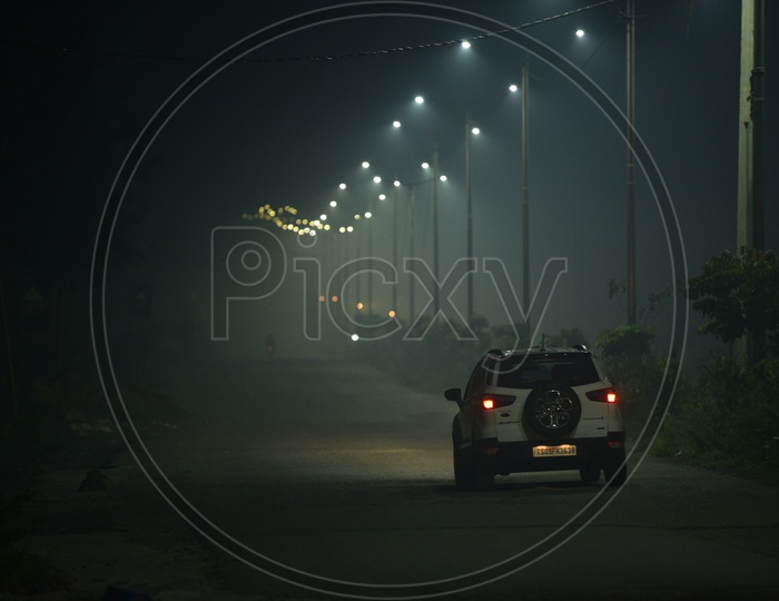Image of Commuting Vehicles On Hyderabad City Roads At Night-GQ750971-Picxy