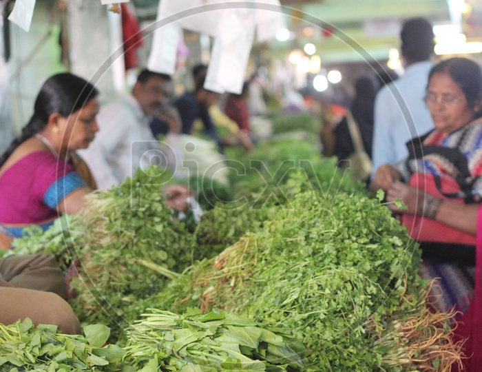 Image of Vegetable Market Scene with buyers and sellers-BZ011366-Picxy