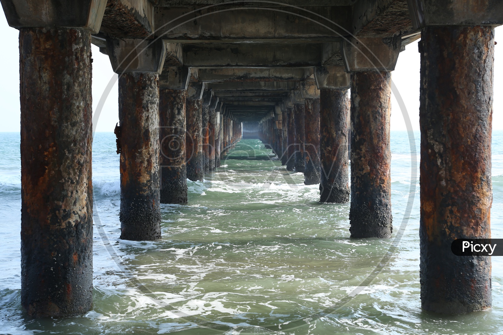 Image of Ennore broken bridge at the beach near Chennai-VM539547-Picxy
