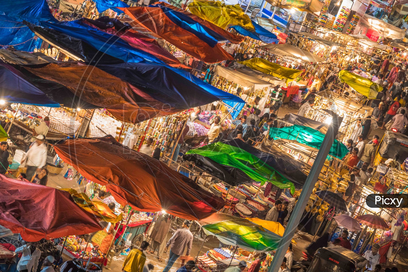Image of Street bazaar vendors during the night-EY984537-Picxy