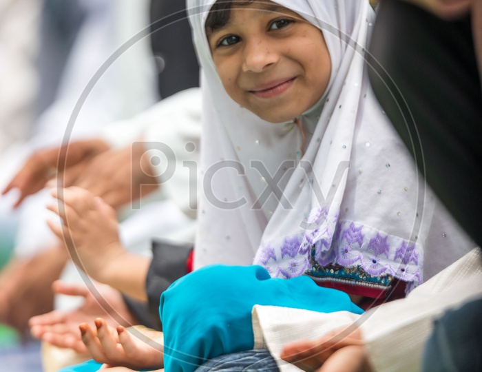 Image of Portrait of a Muslim girl child smiling-AY712180-Picxy