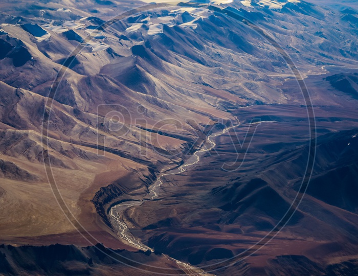 Image of Aerial view of the Indus River flowing alongside the Flood ...