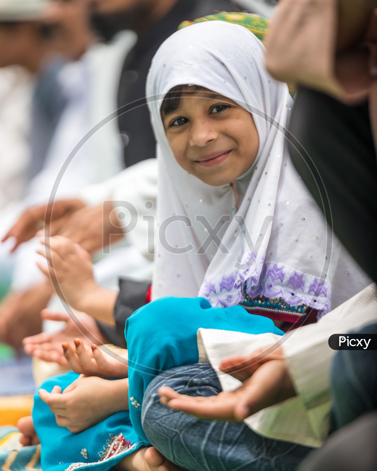 Image of Portrait of a Muslim girl child smiling-AY712180-Picxy