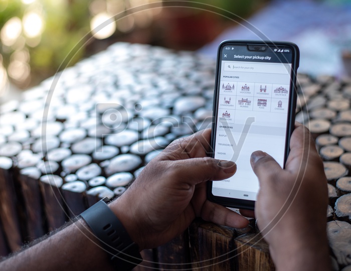 Image of Indian Man Accessing Rapido App For Booking Bike Taxi In Smart ...