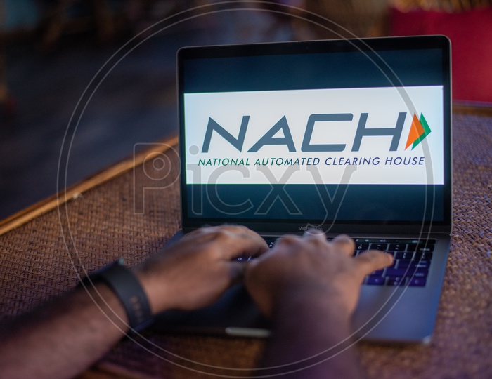 Image of Indian Man Accessing National Automated Clearing House ( NACH ...