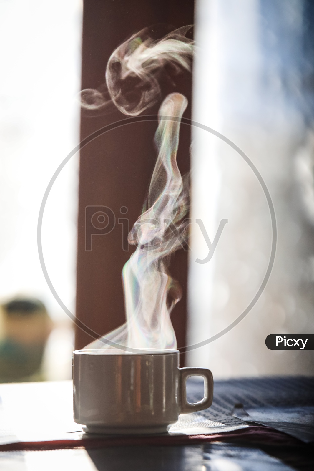 Image of Hot vapour coming out from the cup of tea-IM194770-Picxy
