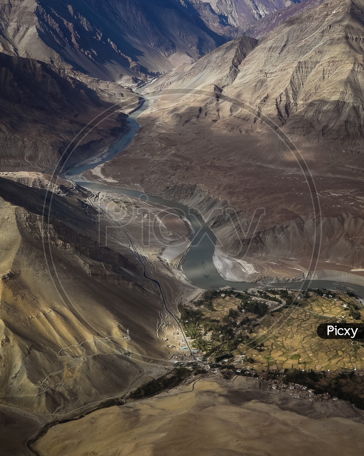 Image of Aerial view of the Indus River flowing through the mountains ...