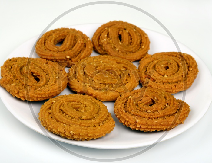 Image of Chakali, Chakari or Murukku, Indian festive food-ZP612630-Picxy
