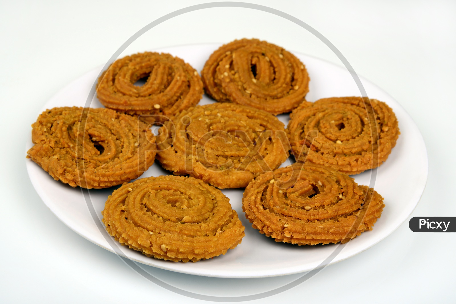 Image of Chakali, Chakari or Murukku, Indian festive food-ZP612630-Picxy