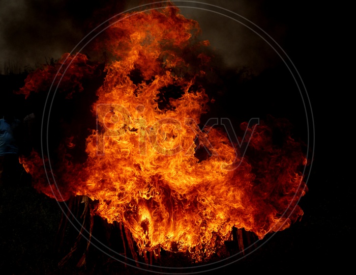 Image of Photograph of Huge Fire flames on black background-IV434599-Picxy