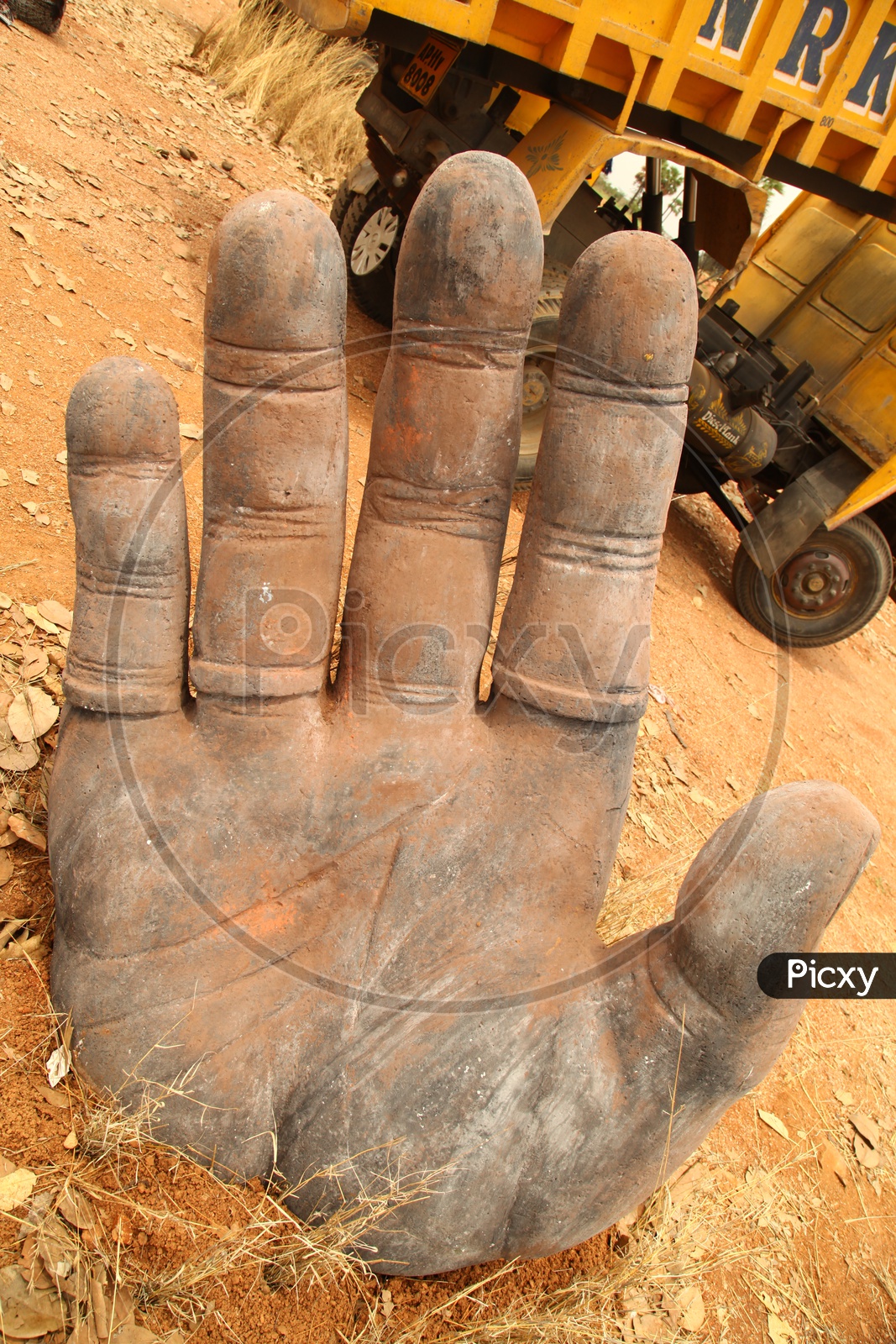 Image of Palm of the Hand statue alongside the Rural Road-ZH256784-Picxy