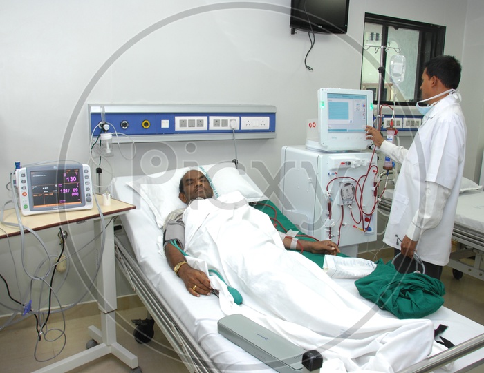 Image of Doctor with a patient in the ICU - Movie scene-BV091274-Picxy