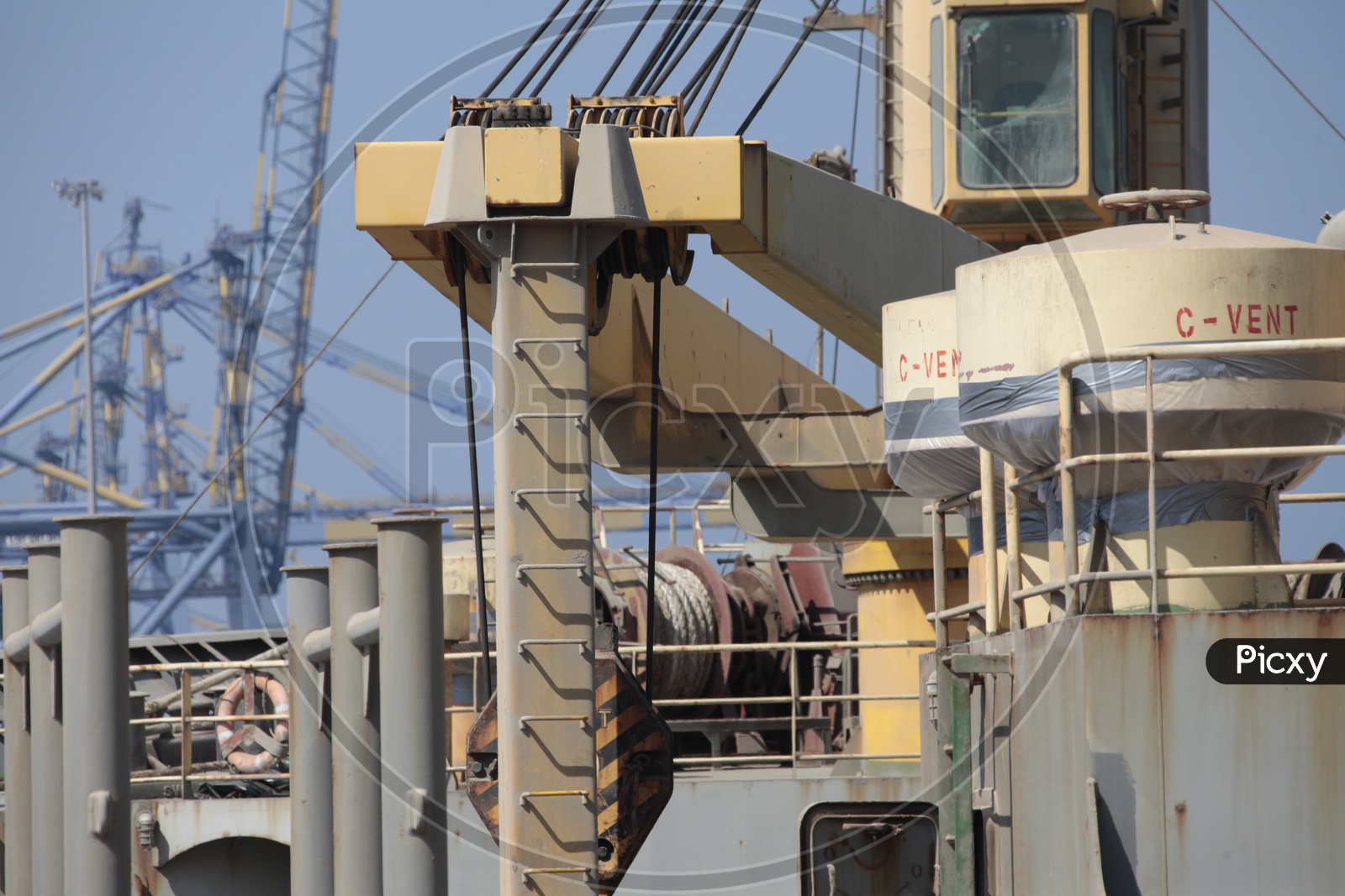 Image of Drivers seat of a crane vessel alongside the vents in a port ...