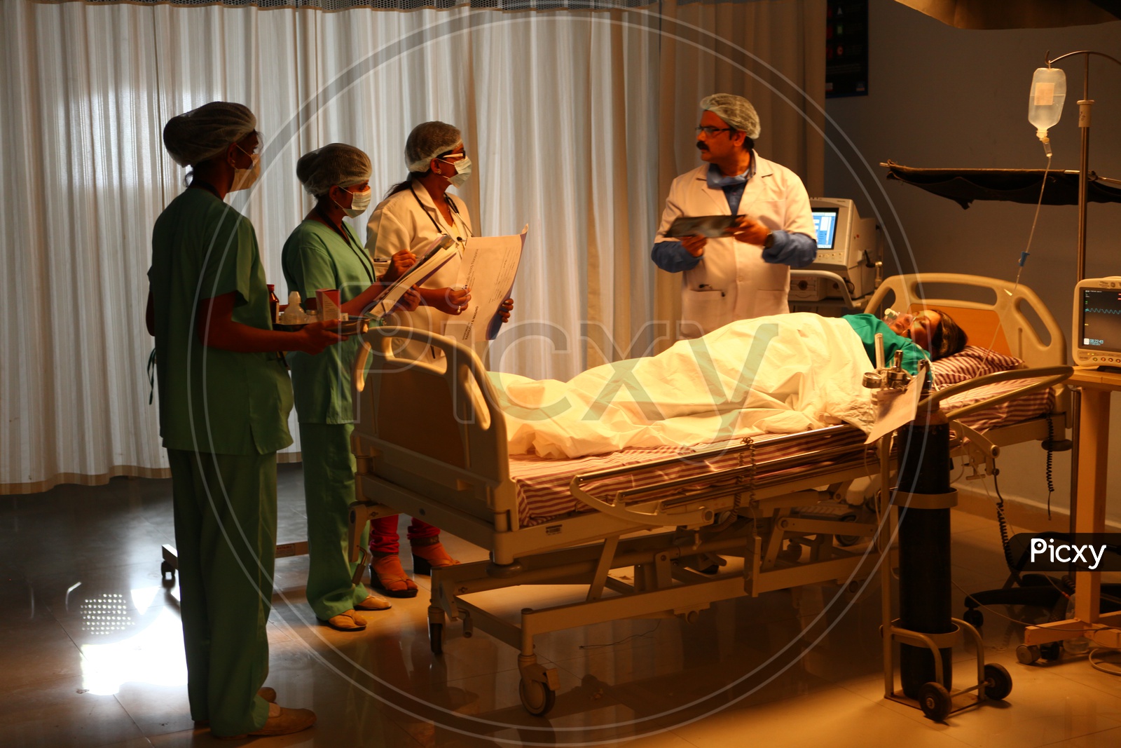 Image of Doctor with the nurses in the operation theater - Movie scene ...