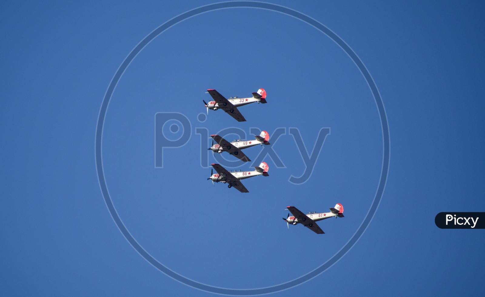 Image of Aerobatic Aircraft Team in Formation at Bangalore Aero India ...