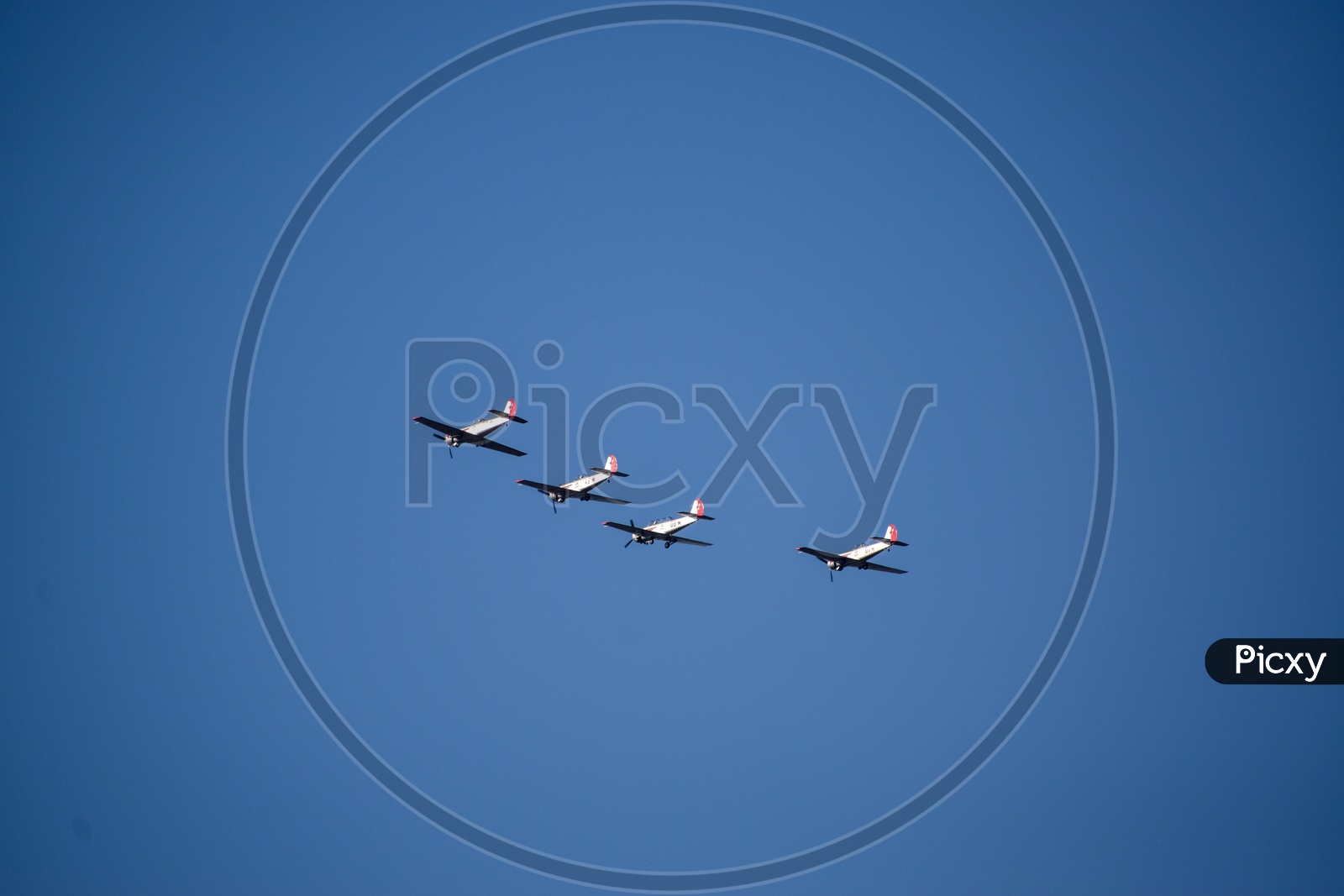 Image of Aerobatic Aircraft Team in Formation at Bangalore Aero India ...