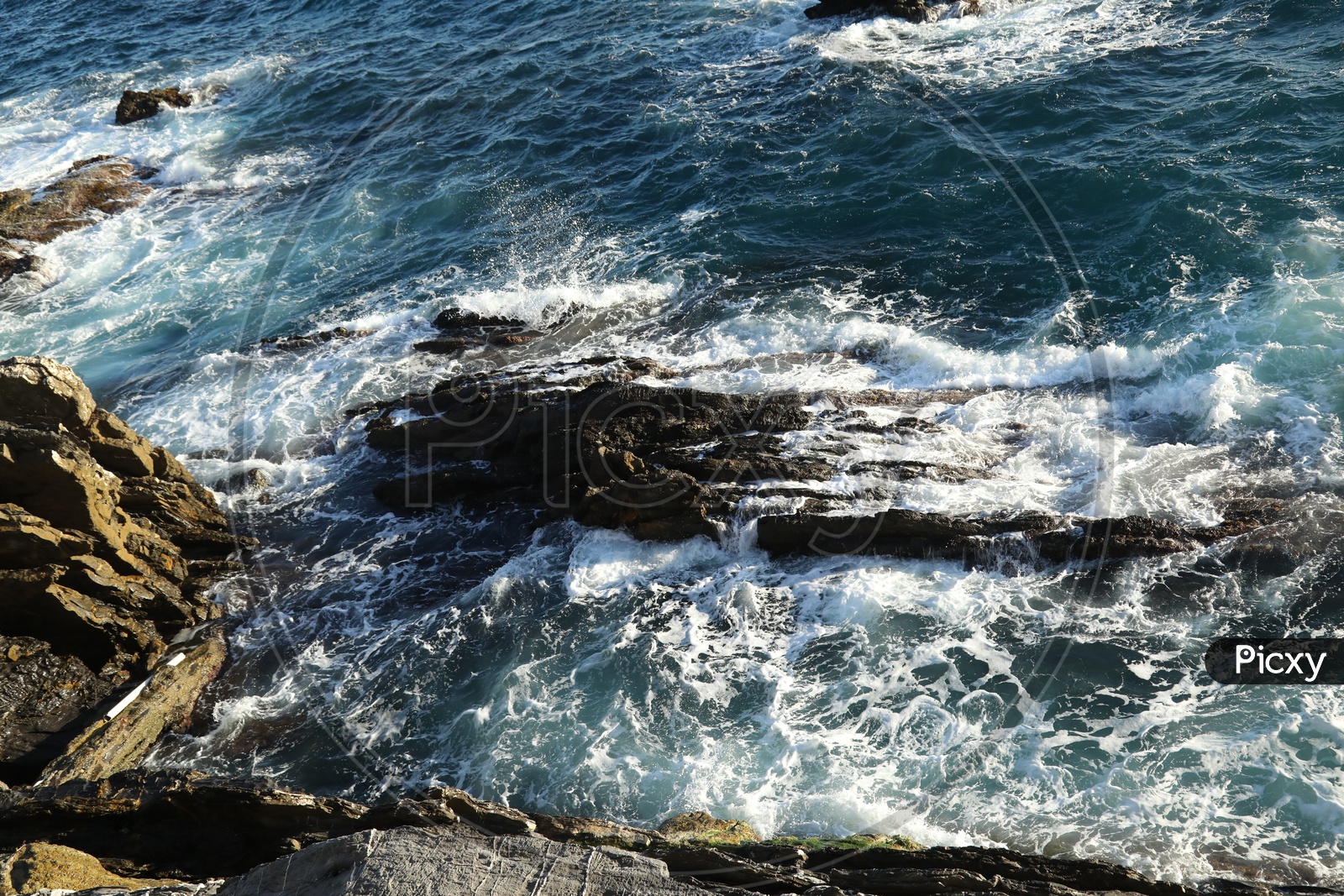 Image of Sea / Ocean Waves Striking The Rocks in a Beach-NT797591-Picxy