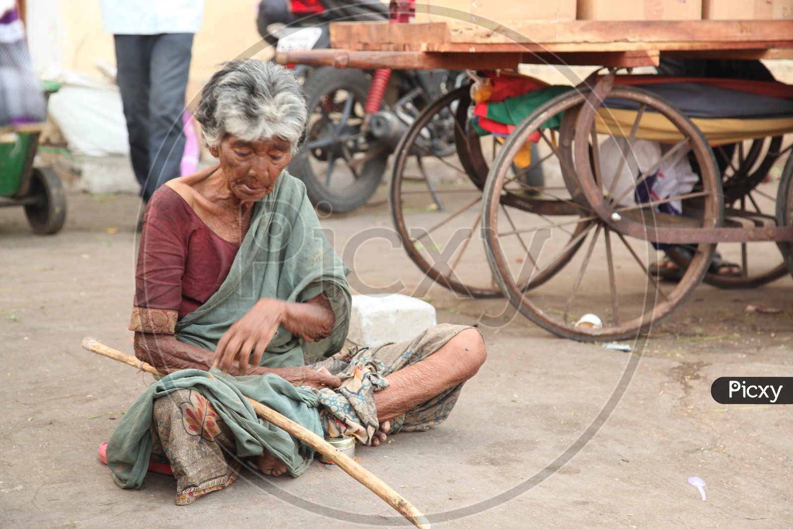 Image of Old woman beggar on a road-RQ426524-Picxy