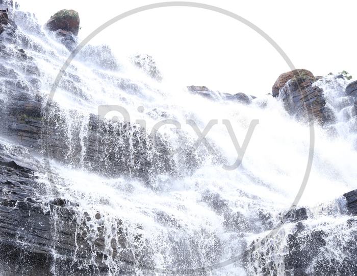 Image of Water Falling On Rocks in a Water Falls-BQ504160-Picxy