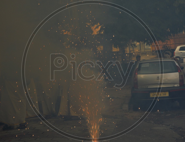 Image of Indians Celebrating Diwali By Firing Crackers on Streets on a ...