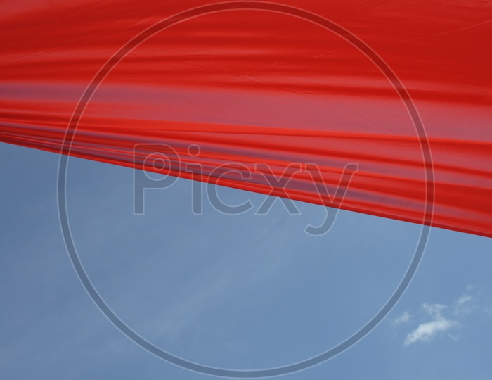 Image of A Red Silk Cloth Waving Patterns In Air Composition Shot ...
