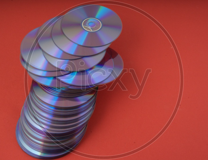 Image of DVD / CD on Red Background-RA271589-Picxy