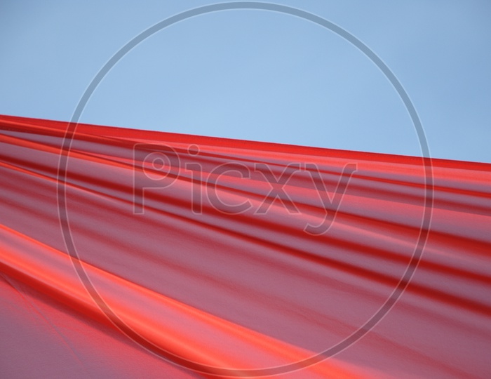 Image of A Red Silk Cloth Waving Patterns In Air Composition Shot ...