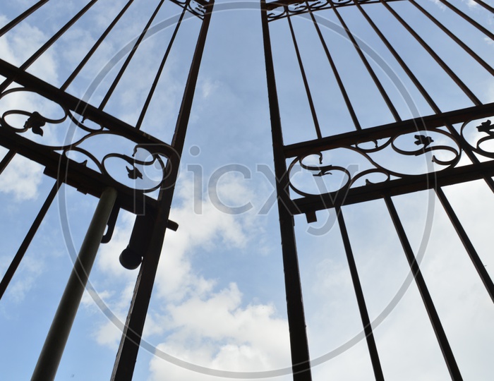 Image of Iron Gate with iron Bars And a Lock Leaver-PF520459-Picxy