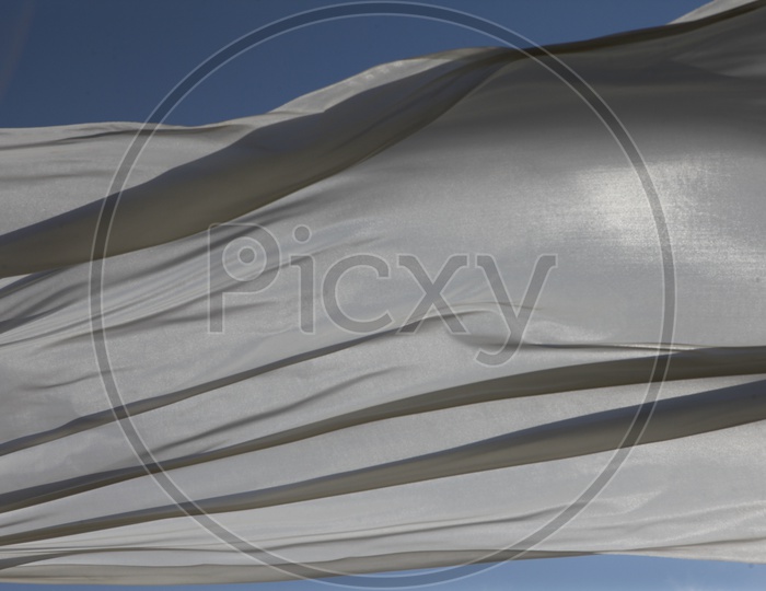 Image of White Silk Cloth Flying Or Waving In Air With Sky And Clouds ...